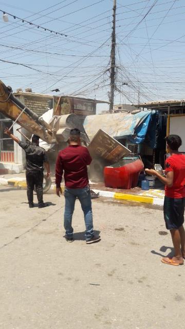 بالصور.. ازالة تجاوزات في الدورة والرشيد والكاظمية | محليات